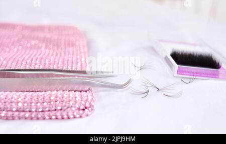 Bunches of fake lashes fell down after eyelash extensions, beauty salon ...