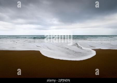 Waves on beach at Waipatiki Beach, near Napier, Hawkes Bay, North ...