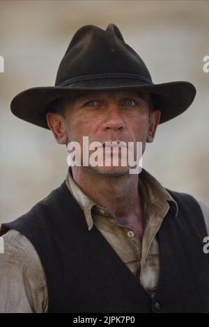 COWBOYS AND ALIENS 2011 Universal film with Harrison Ford at left and ...