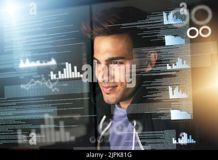Encoding in progress. a male computer programmer working on new code ...