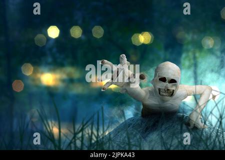 Mummy with skull head crawling with a night scene background. Halloween ...