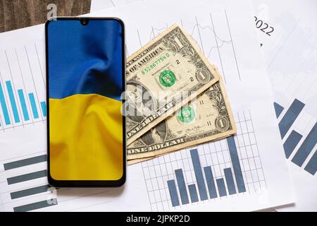 Dollars on flag of Ukraine, Ukrainian finance, subsidies, social ...