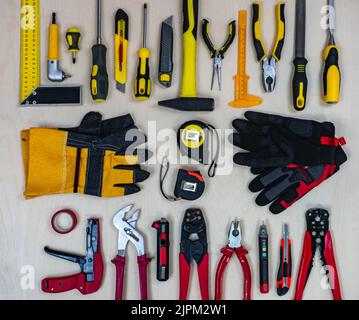 screwdrivers and construction tools on yellow background equipment for ...