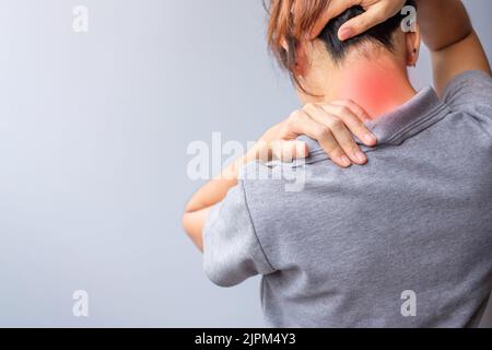 woman with her neck sprain, muscle painful during overwork. Girl having ...