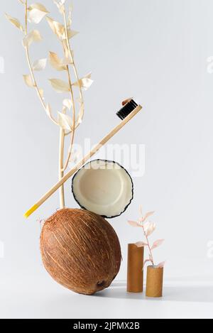 Eco-friendly bamboo toothbrushes and dentifrice on beige background ...
