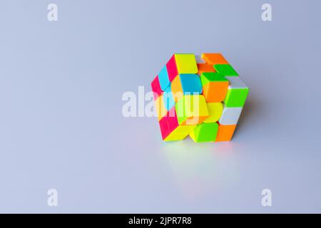 Isolated unsolved rubik puzzle cube perspective view on white background Stock Photo - Alamy
