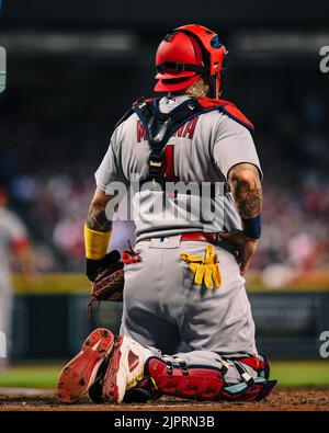 St. Louis Cardinals catcher Yadier Molina puts on his gear during ...