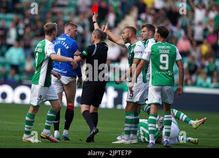 Referee William Collum shows Rangers' John Lundstram a red card during ...