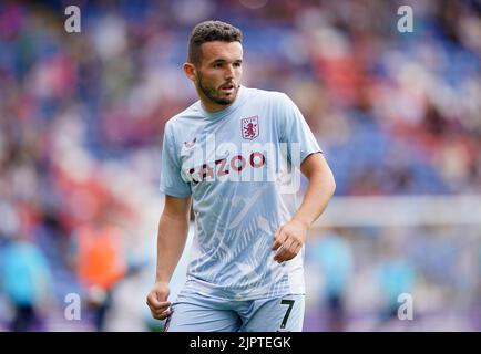 Aston Villa's John McGinn warming up before the Premier League match at ...