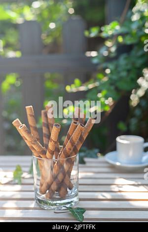 chocolate tubes with chocolate filling, dessert of chocolate waffle ...