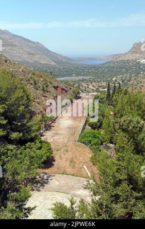Dwarf elephant cave excavation site fence and gate. Tilos, Greece Stock ...