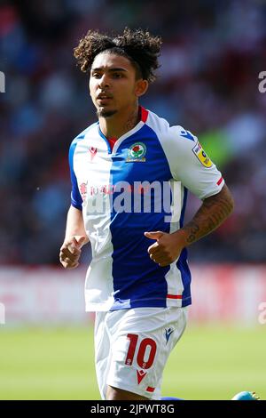 Tyrhys Dolan #10 of Blackburn Rovers poses for a photo with young ...