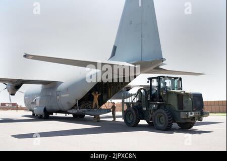 Members stationed at Nigerien Air Base 201, Niger, attend an all call ...