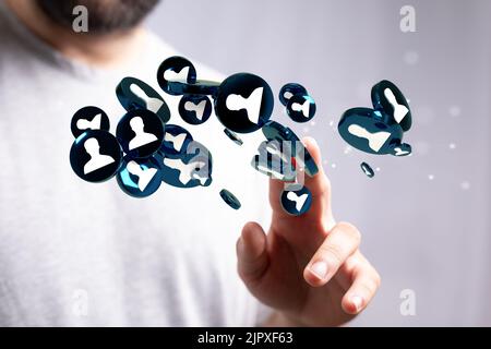 Two fingers tapping on a screen with a group of illustrated people ...