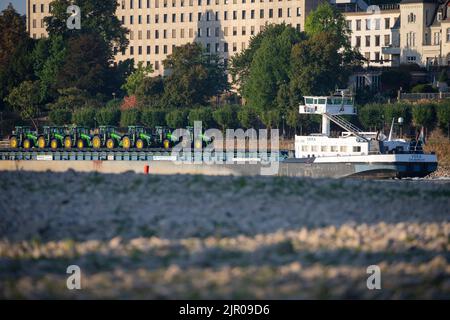 Bonn, Germany. 21st Aug, 2022. A cargo ship is sailing on the Rhine ...