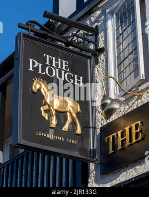 Traditional hanging pub sign at The Plough - Shepherd Neame public ...