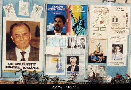 Romania, 1992. Electoral posters in public place before the ...