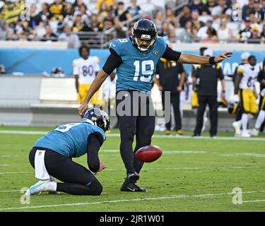 Jacksonville Jaguars kicker Ryan Santoso works on field goals during an ...