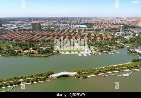 QINGDAO, CHINA - AUGUST 21, 2022 - Citizens take a yacht to visit the ...