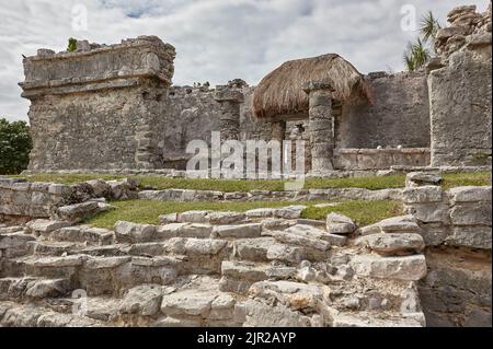 Side view of the remains of a small Mayan temple in the Tulum complex ...