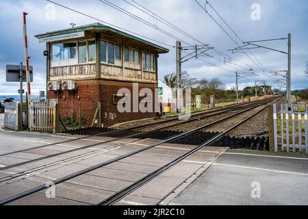 Hest Bank Level crossing with barriers and flashing lights on the west ...