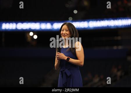 USA Gymnastics president Li Li Leung poses with overall winner Asher ...