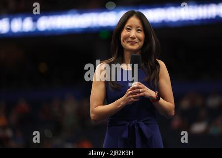USA Gymnastics president Li Li Leung poses with overall winner Asher ...