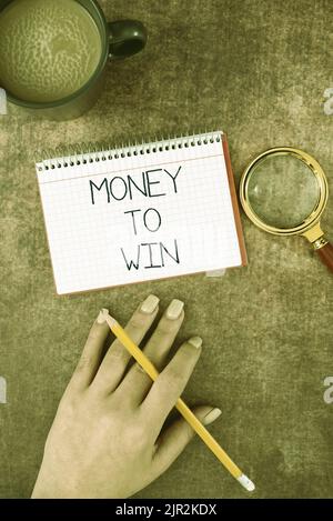 Hand writing sign Money To Win, Internet Concept Calculating revenues ...