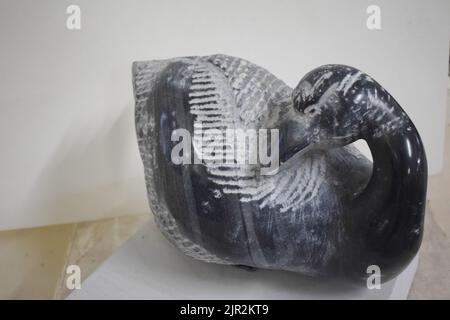 Sculpture of swan which is made from black stone Stock Photo - Alamy