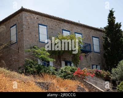 Villa with wooden shutters on Greek island of Hydra Stock Photo - Alamy