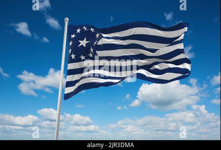 flag of Alleged Mormon 1877, America at cloudy sky background ...