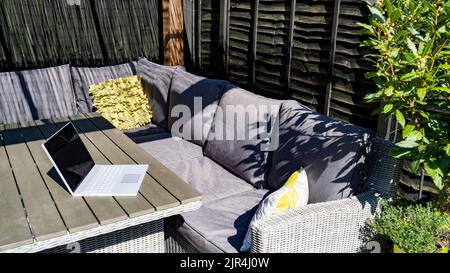 Working from home setup in a garden Stock Photo - Alamy