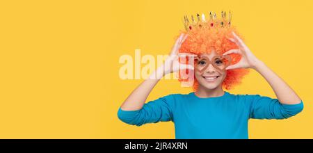 cheerful selfish child girl in curly wig and party glasses pointing ...