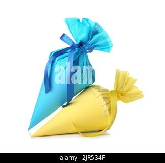 Colourful school cones on white background Stock Photo - Alamy