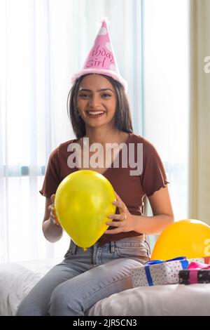 positive woman with birthday balloon in sunglasses. happy birthday ...