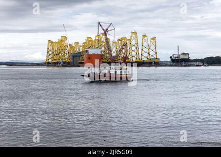 The Renfrew Rose ferry makes its way across the Cromarty Firth between ...
