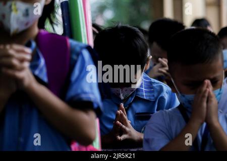 Manila, Philippines. 22nd Aug, 2022. Parents and guardians watch as ...