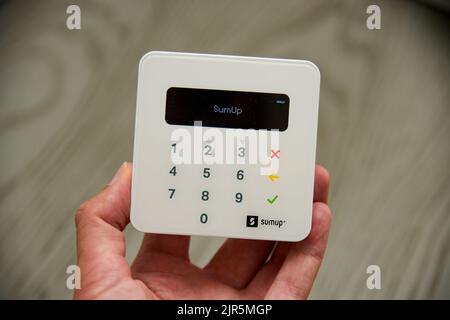 view on the sumup payment terminal on anoffice Stock Photo - Alamy