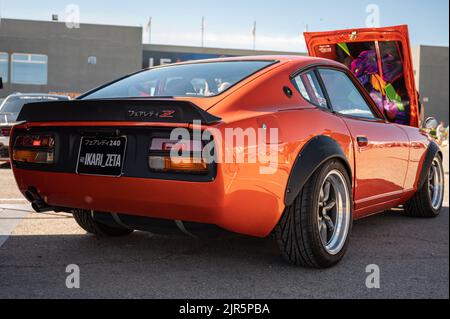A classic orange Japanese Datsun 240z parked at an exhibition Stock Photo - Alamy