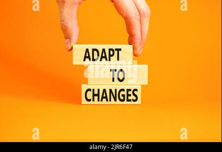 Adapt to changes symbol. Concept words Adapt to changes on wooden ...