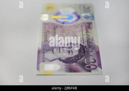 Lying banknote of 20 British pounds on a gray background Stock Photo ...