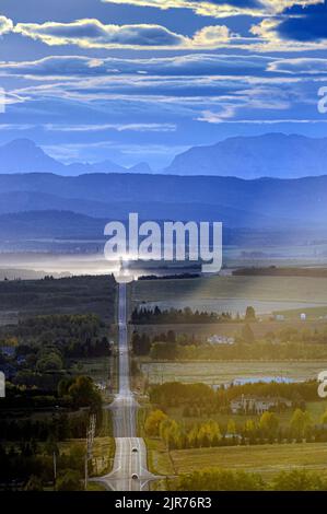 Springbank Road looking westward toward the Rocky Mountains and Banff ...