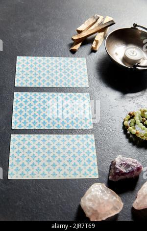 tarot cards and magic staff for divination ritual Stock Photo - Alamy