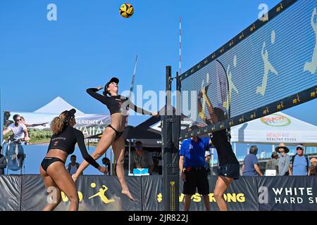 August 19, 2022: Zana Muno serves during day one of the AVP Manhattan ...
