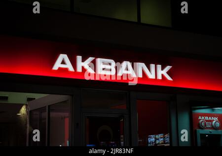 Picture of a sign with the logo of Turkiye IS Bankasi taken in front of ...
