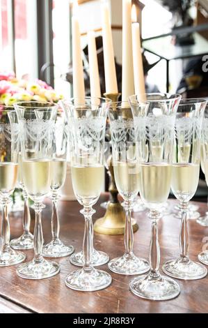 Rottweil, Germany. 20th Aug, 2022. A wedding guest holds a champagne ...