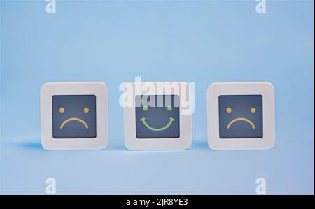 Set of computers with stylized faces of happy and sad faces on lcd ...