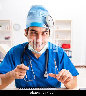 Mad doctor working in the clinic Stock Photo - Alamy