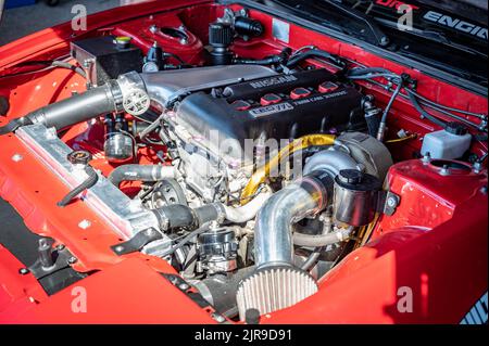 A detail of an improved gasoline engine of Nissan Silvia S13 with open ...