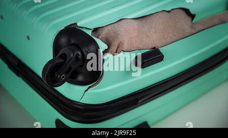 Mint damaged suitcase on a white background Stock Photo - Alamy